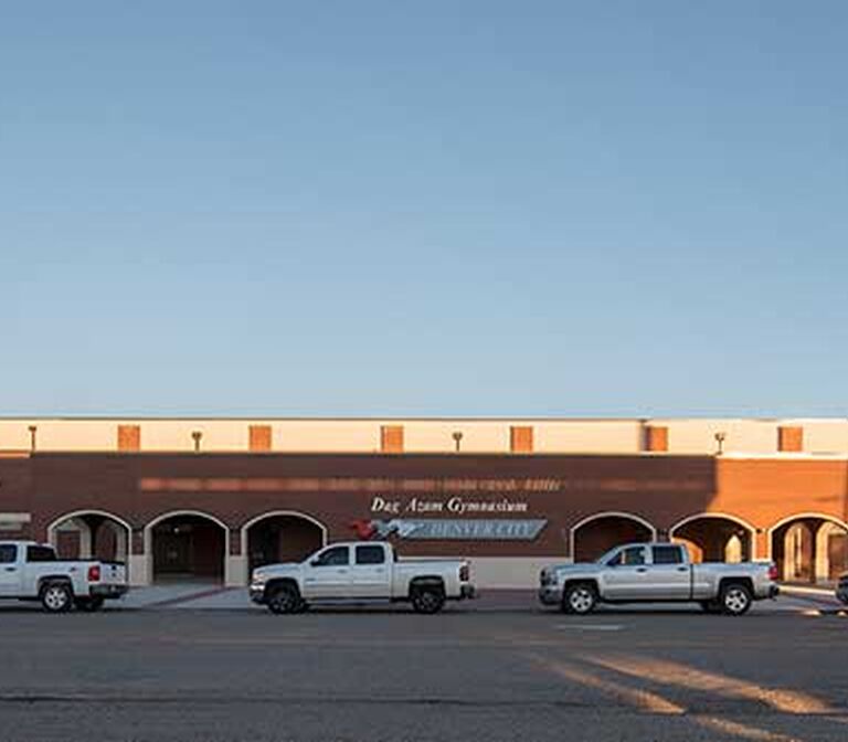 Denver City High School gymnasium with Patriot arena chairs and…