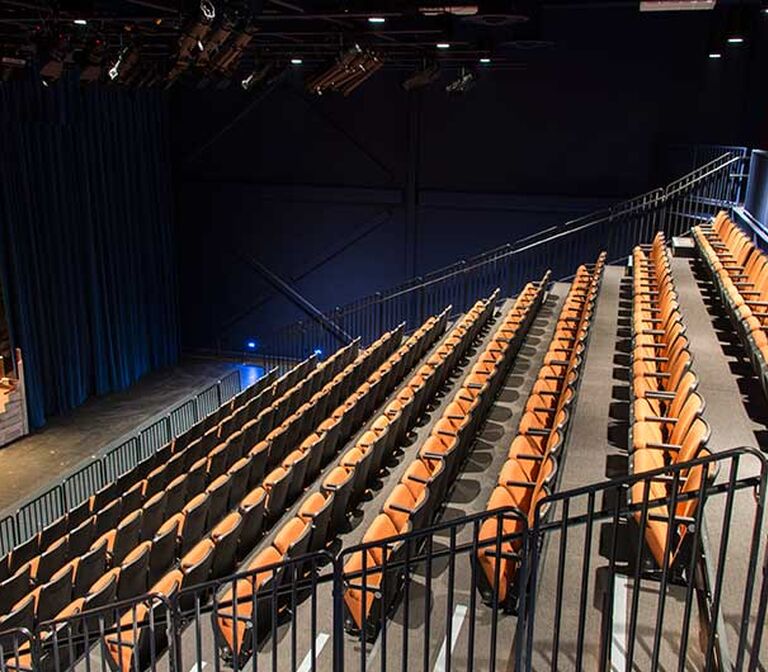 Jenny Wiley Theatre with forward fold Citation chairs on a Prestige…