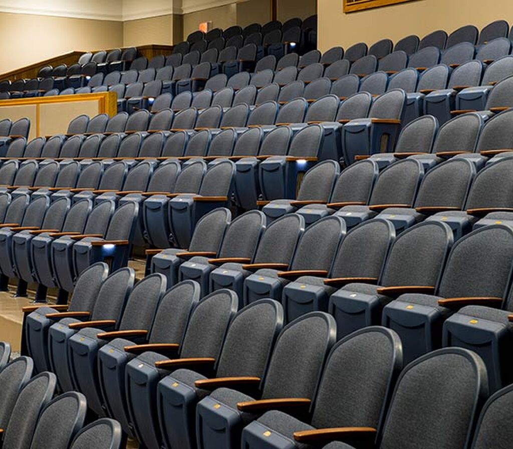 Kenmore West High School fixed audience seating by Irwin Seating with…
